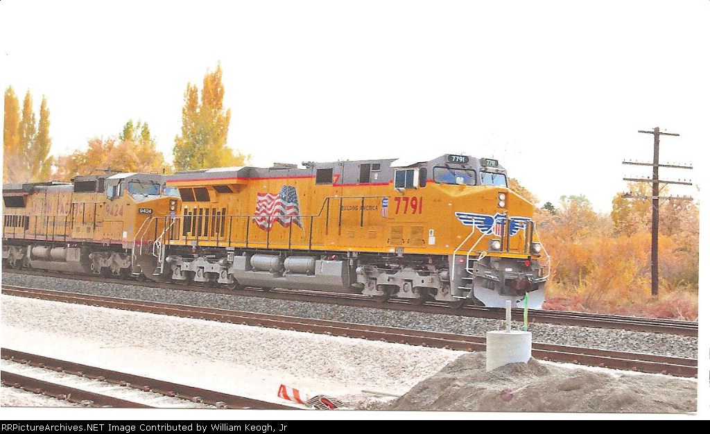 :UP 7791 gos past layton Ut on a hazy day